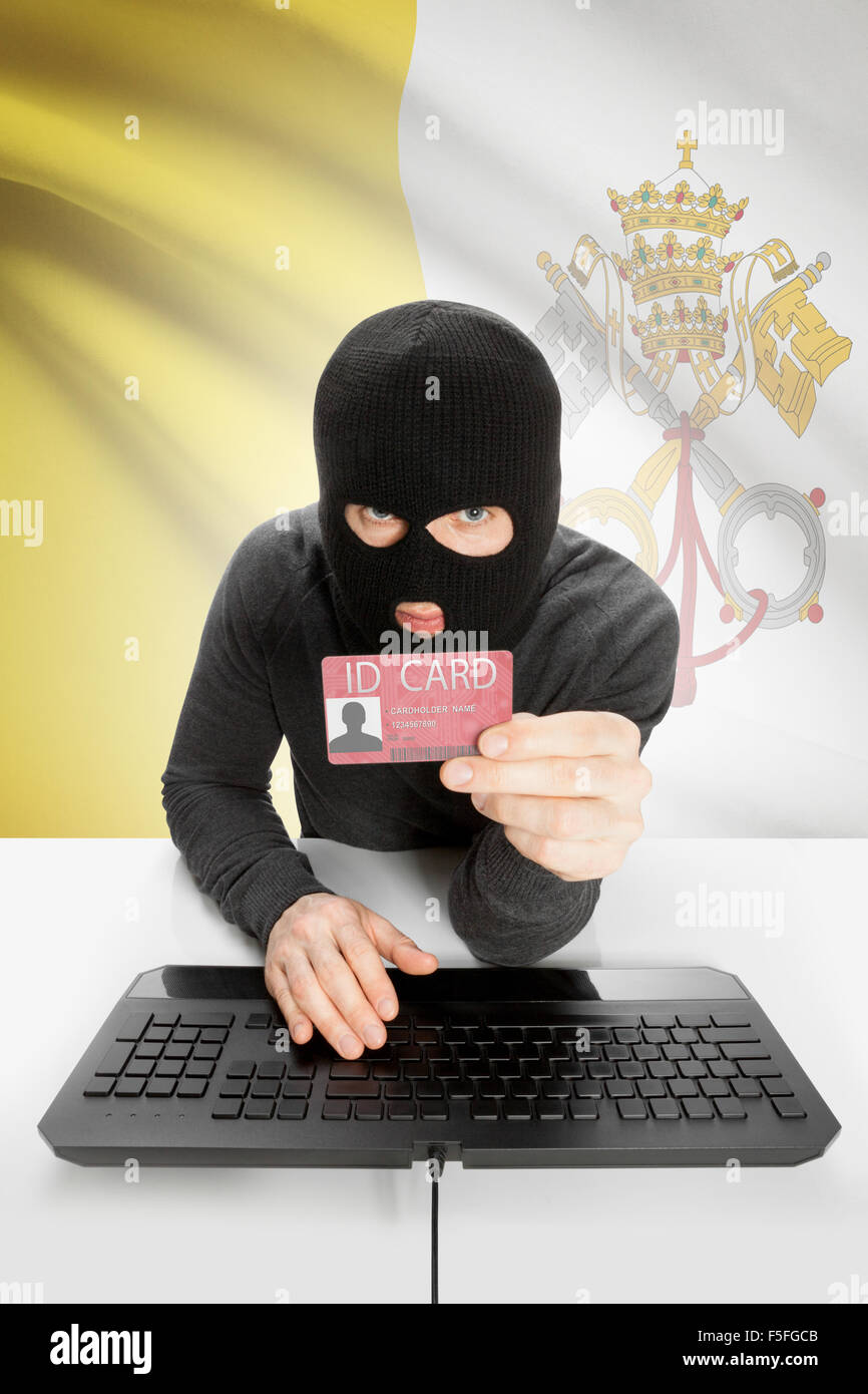 Hacker with ID card in hand and flag on background - Vatican City State ...