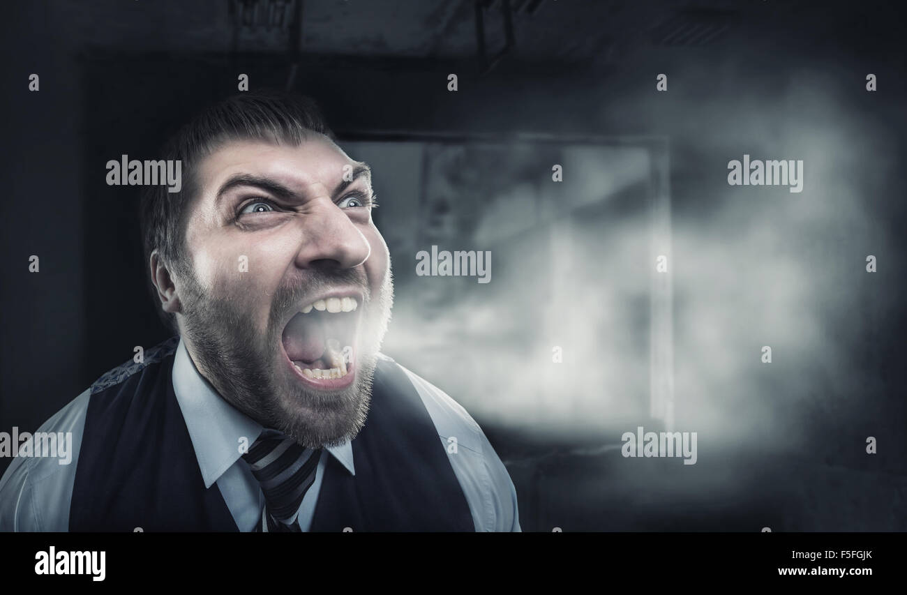 Angry man screaming Stock Photo - Alamy