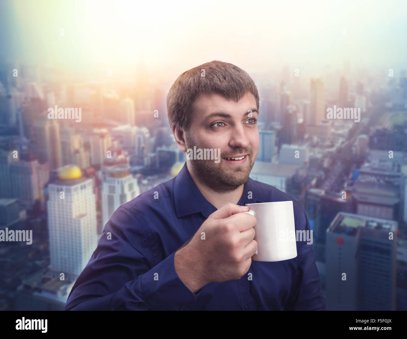 Man drinking coffee Stock Photo - Alamy