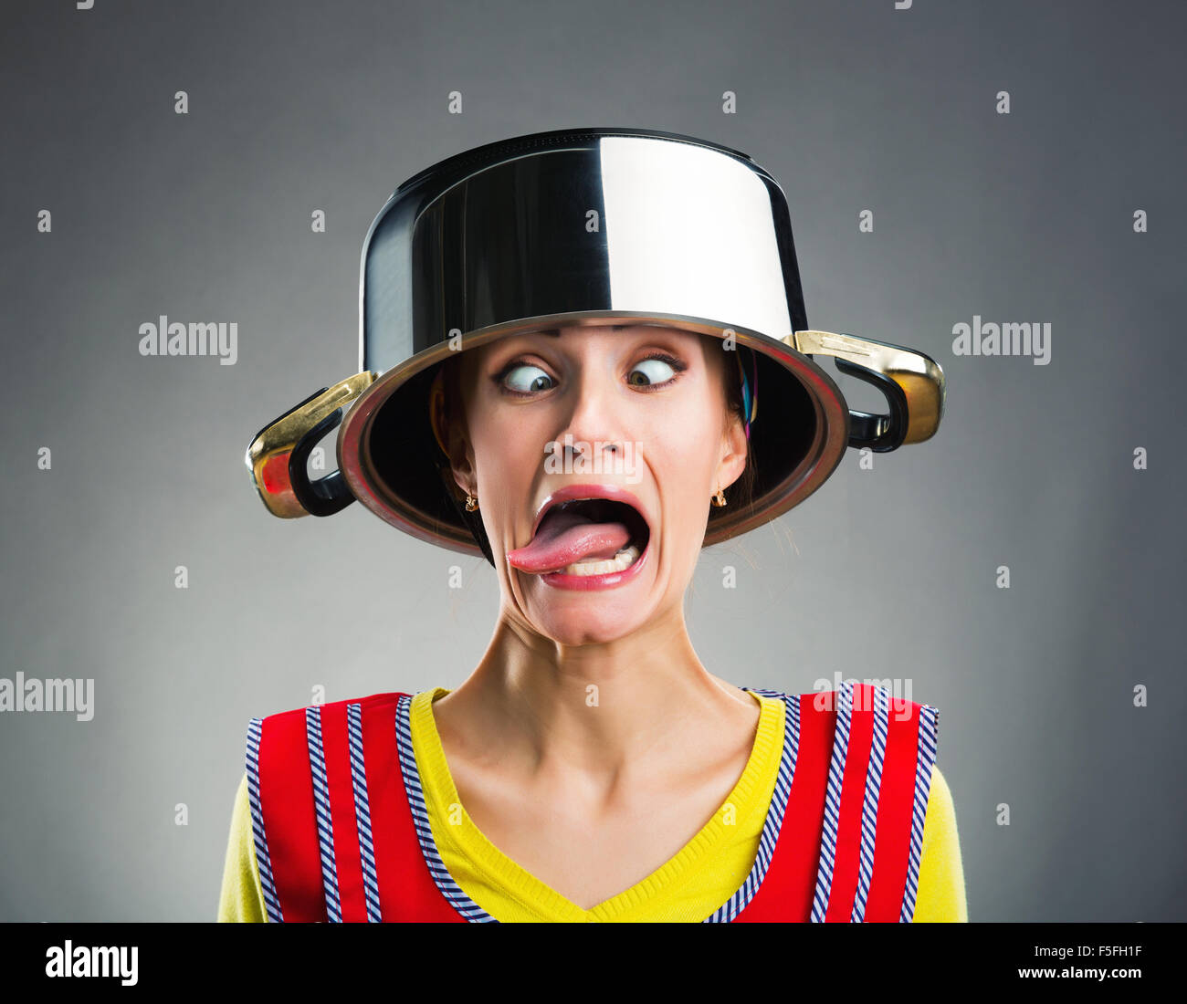 Girl with pan on head hi-res stock photography and images - Alamy