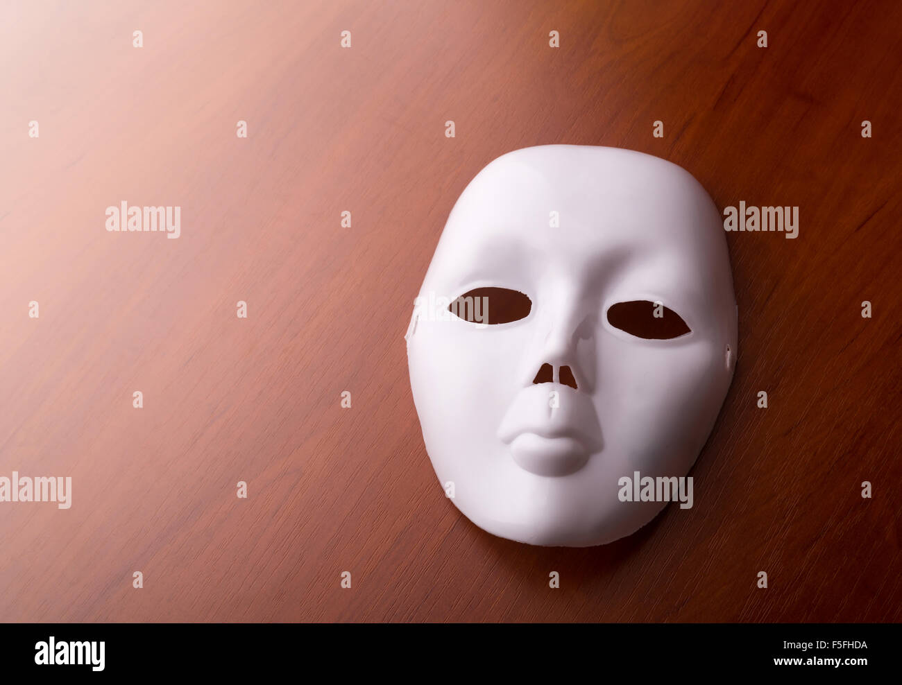 Theater mask on the table Stock Photo - Alamy