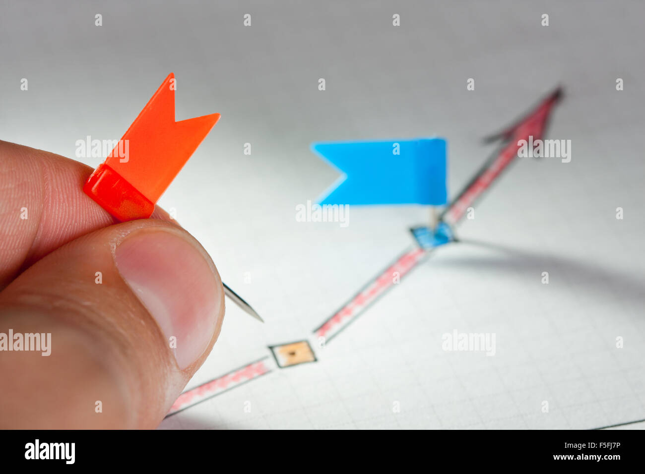 Businessman marking control points Stock Photo - Alamy