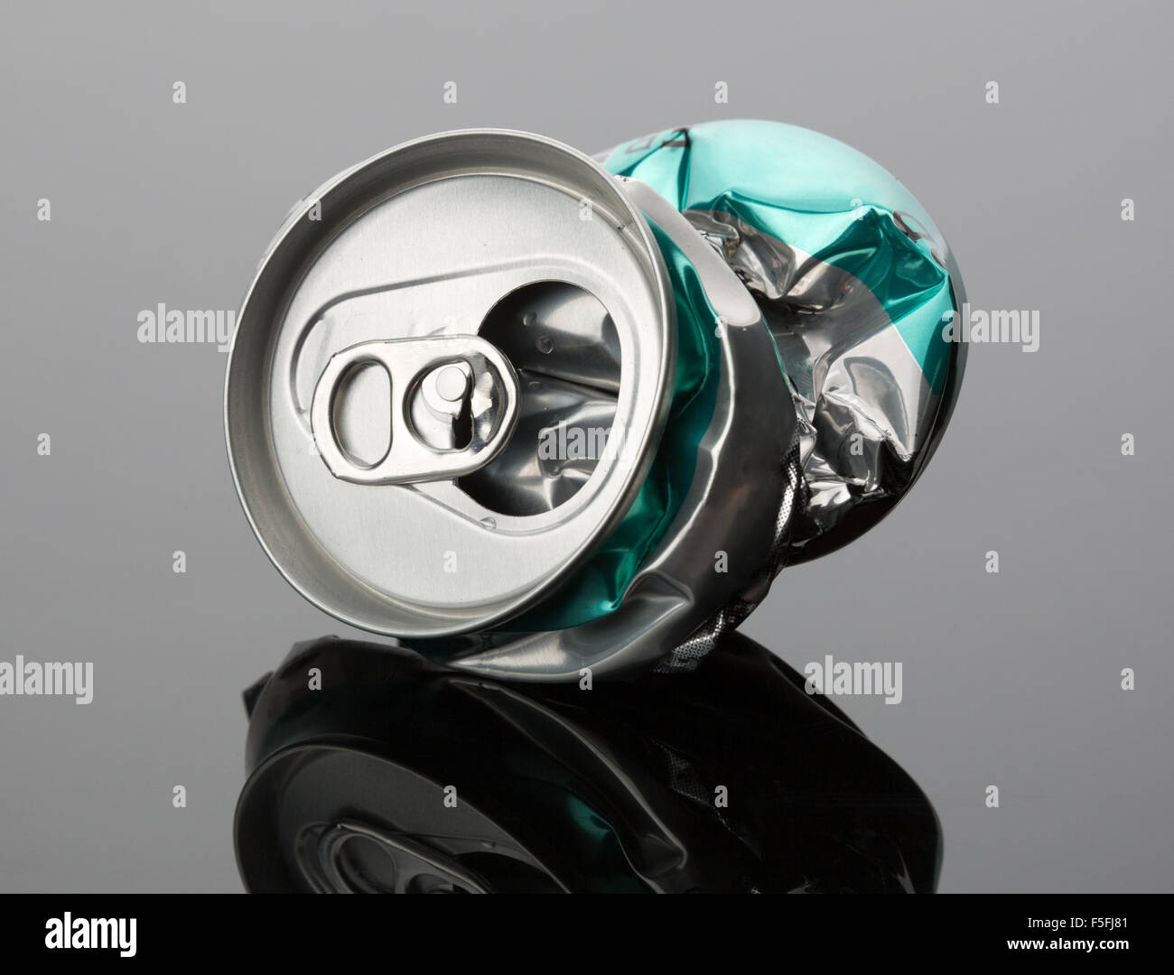 Crumpled beverage can Stock Photo - Alamy