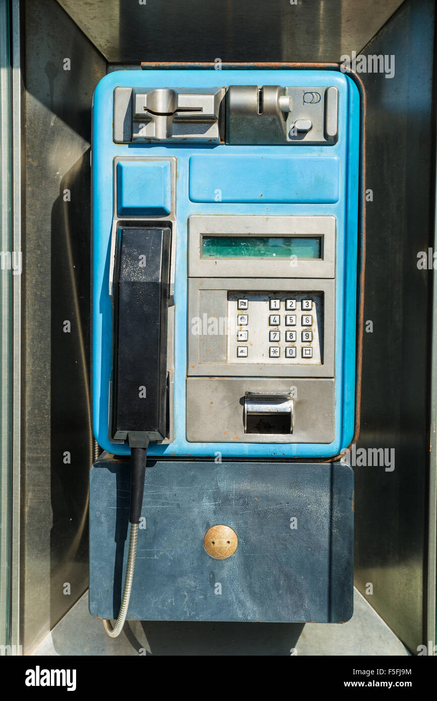Old payphone in working order inside a phone box Stock Photo - Alamy