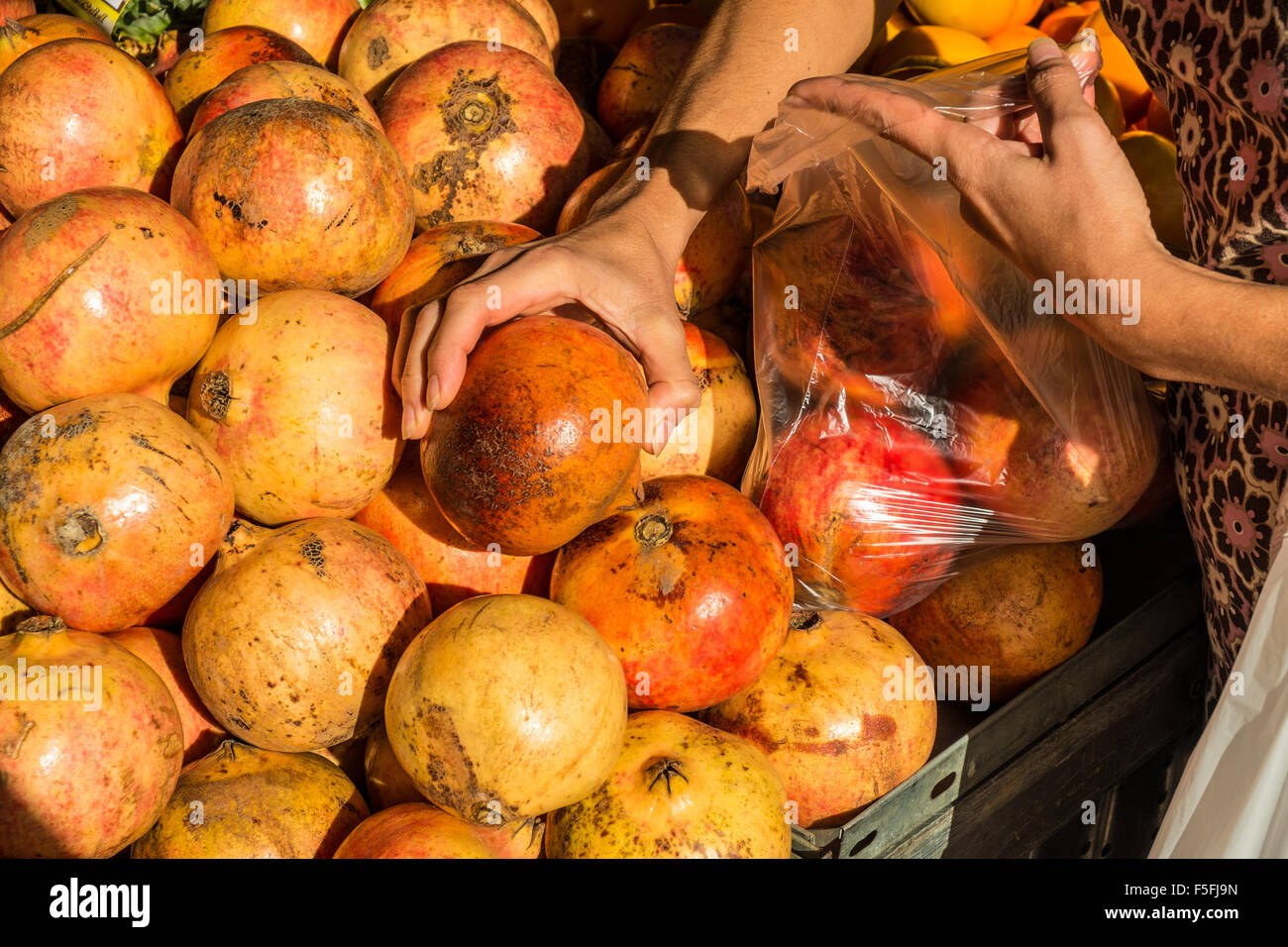 Hands grabbing fruit hi-res stock photography and images - Alamy