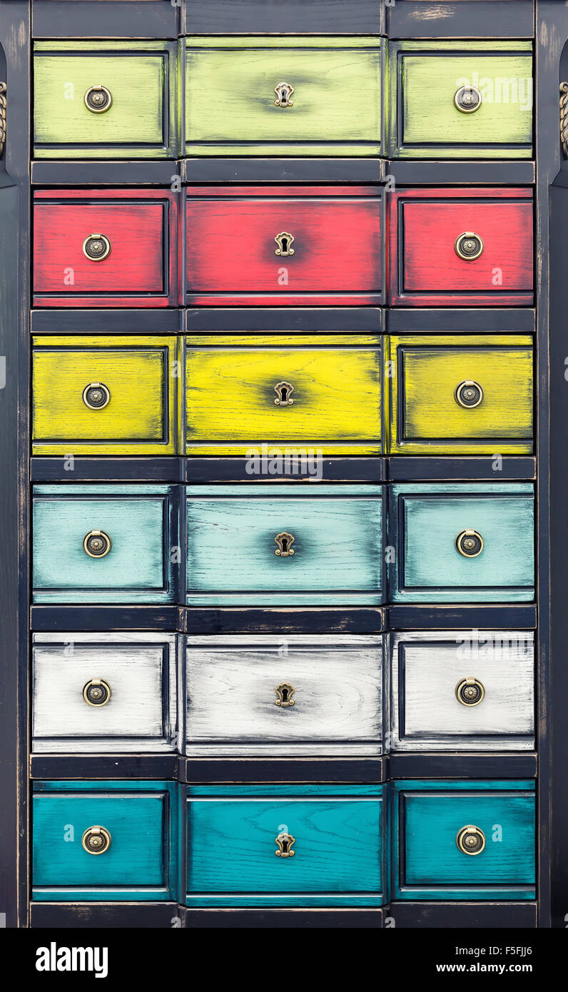 Cupboard with multicolored drawers Stock Photo - Alamy