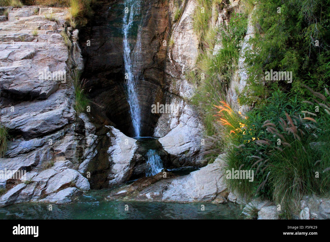 Pretty natural waterfall in the desert Stock Photo - Alamy