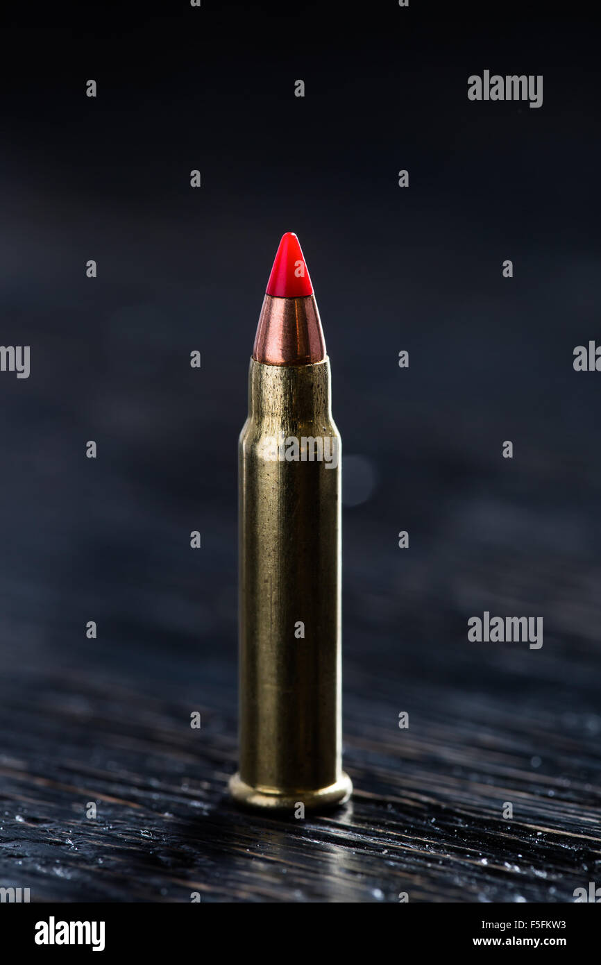 Small-caliber tracer cartridges on a dark background Stock Photo - Alamy