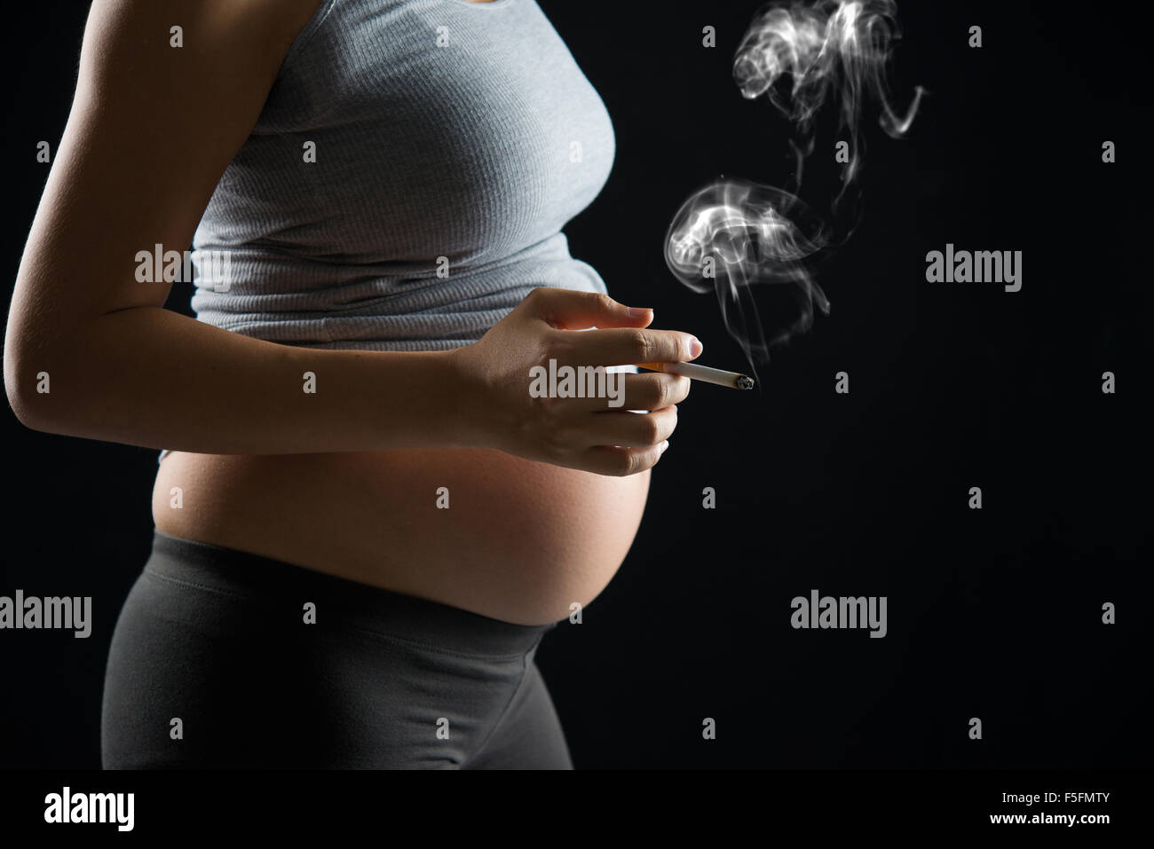asian mother smoking Stock Photo - Alamy