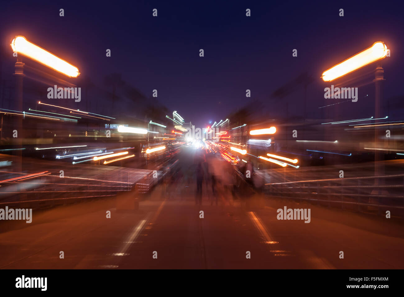 Street motion, urban magical glowing blurred out of focus night shot ...