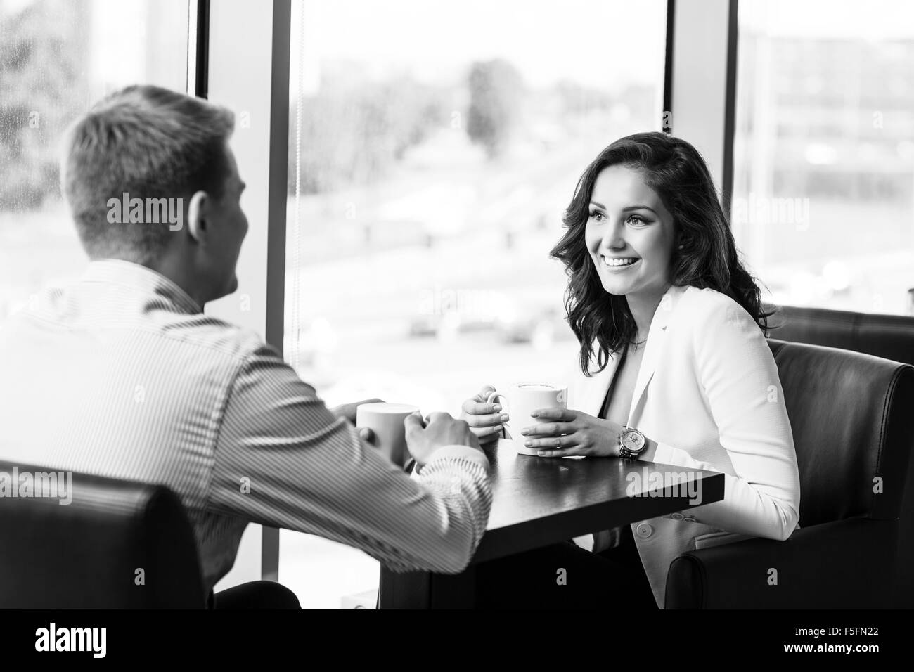 Coffee laughing Black and White Stock Photos & Images - Alamy