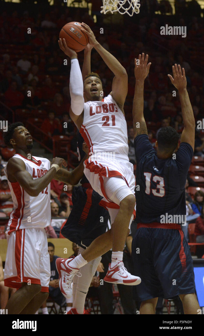 Nov. 3, 2015 - U.S. - SPORTS -- UNM's Xavier Adams, 21, shoots over CSU ...