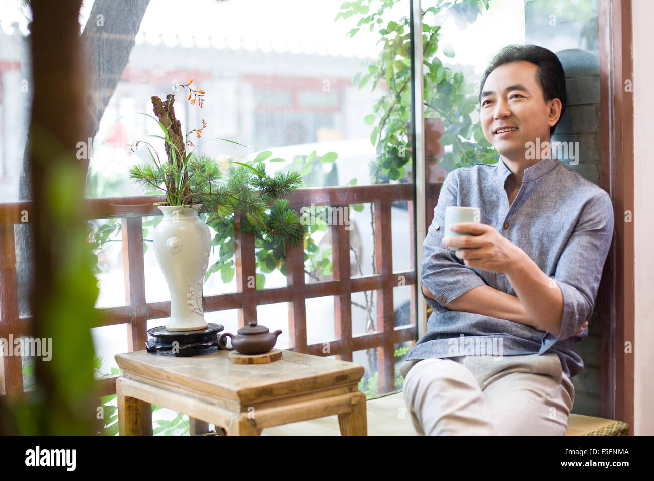 Mature man drinking tea hi-res stock photography and images - Alamy