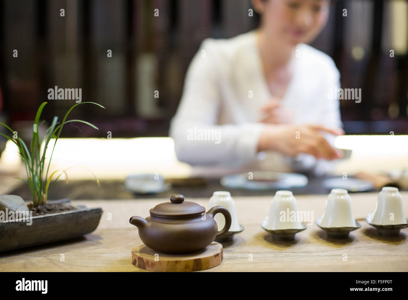 Sitting at a tea table in front row hi-res stock photography and images ...
