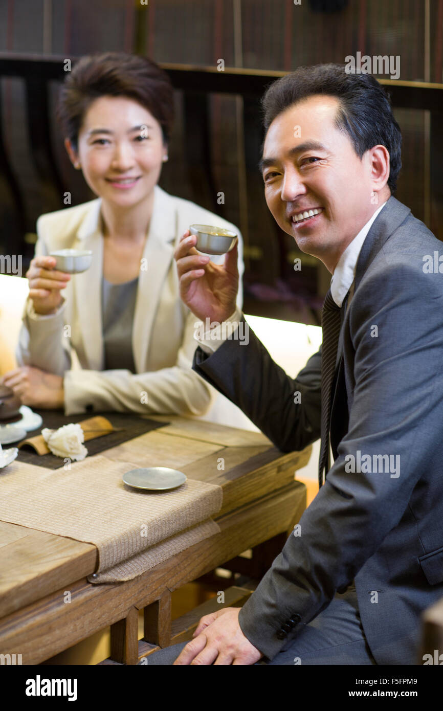 Indian business people drinking tea hi-res stock photography and images ...