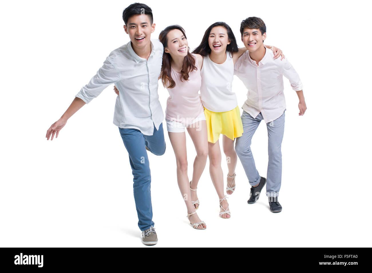 Happy young adults Stock Photo - Alamy