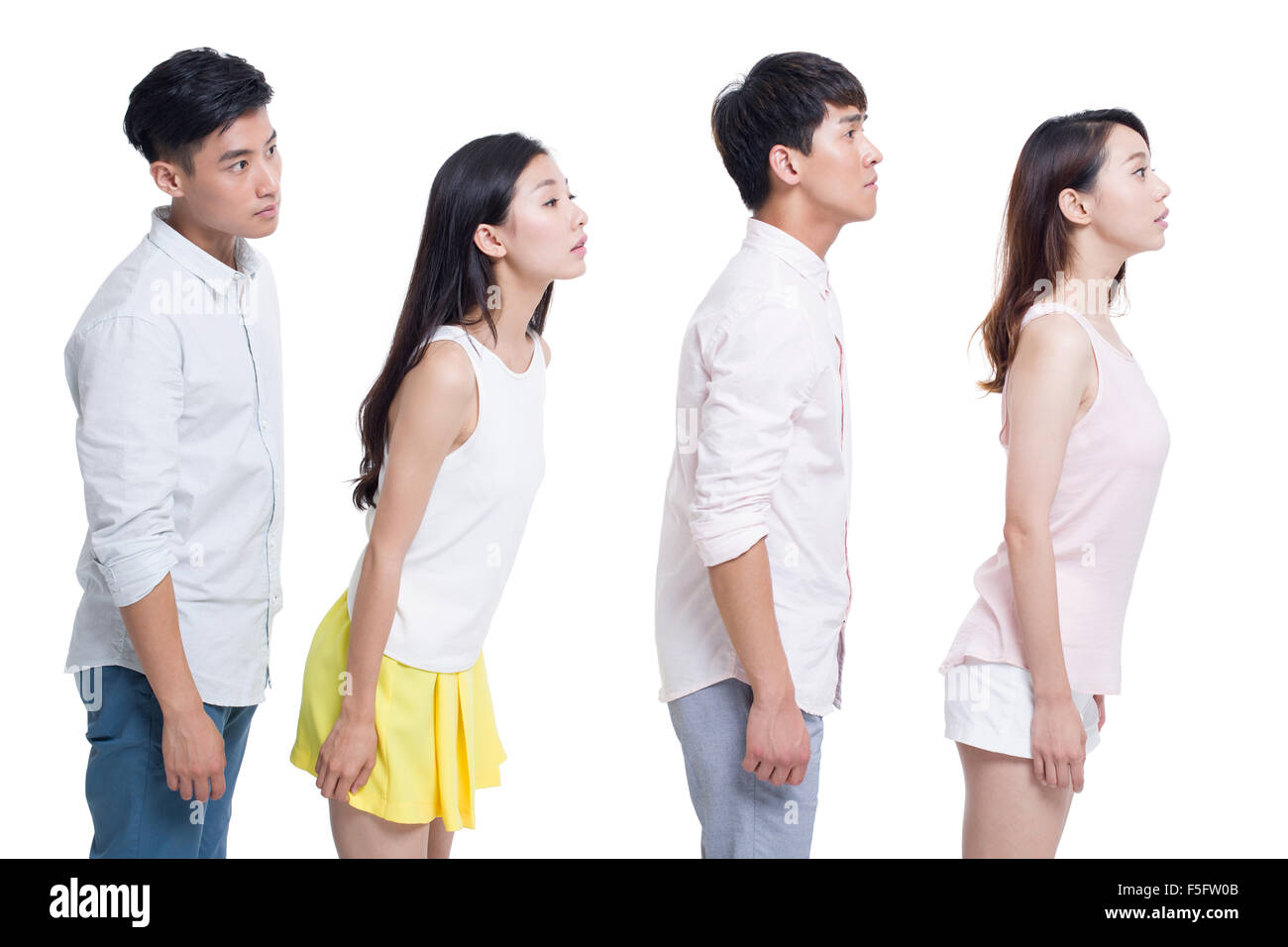 Young adults waiting in line Stock Photo - Alamy