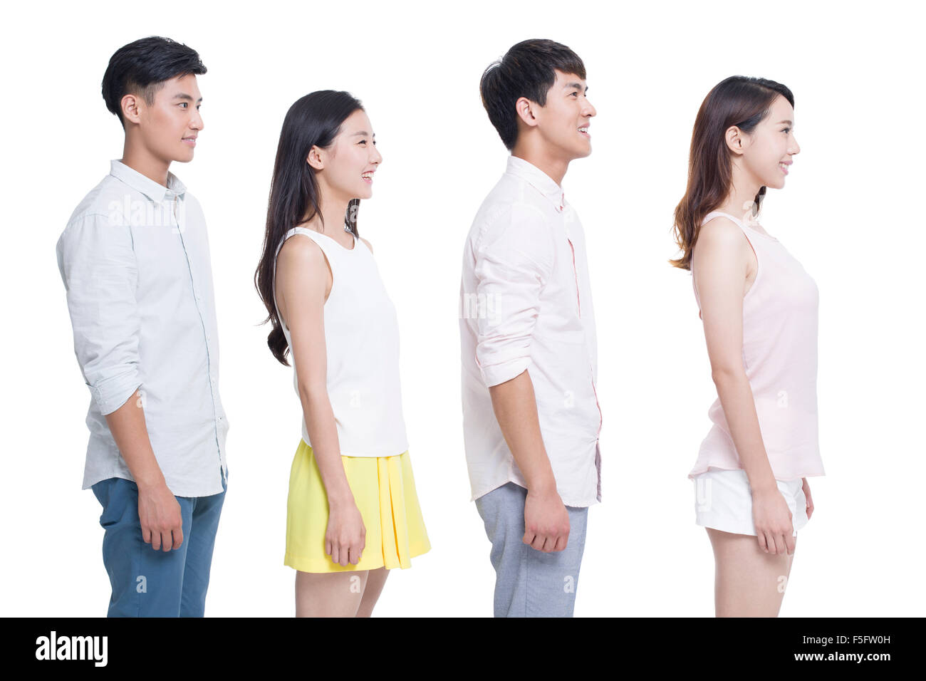 Young adults waiting in line Stock Photo - Alamy