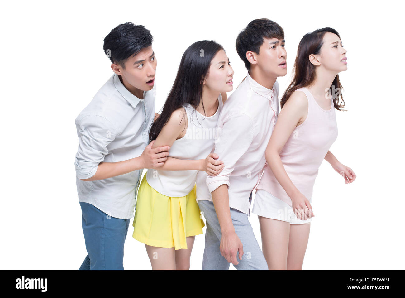 Young adults waiting in line Stock Photo - Alamy