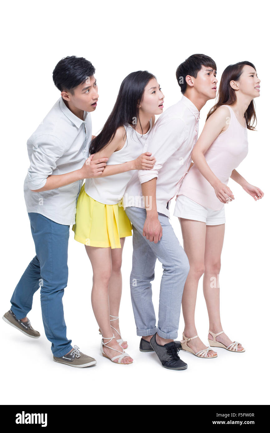 Young adults waiting in line Stock Photo - Alamy