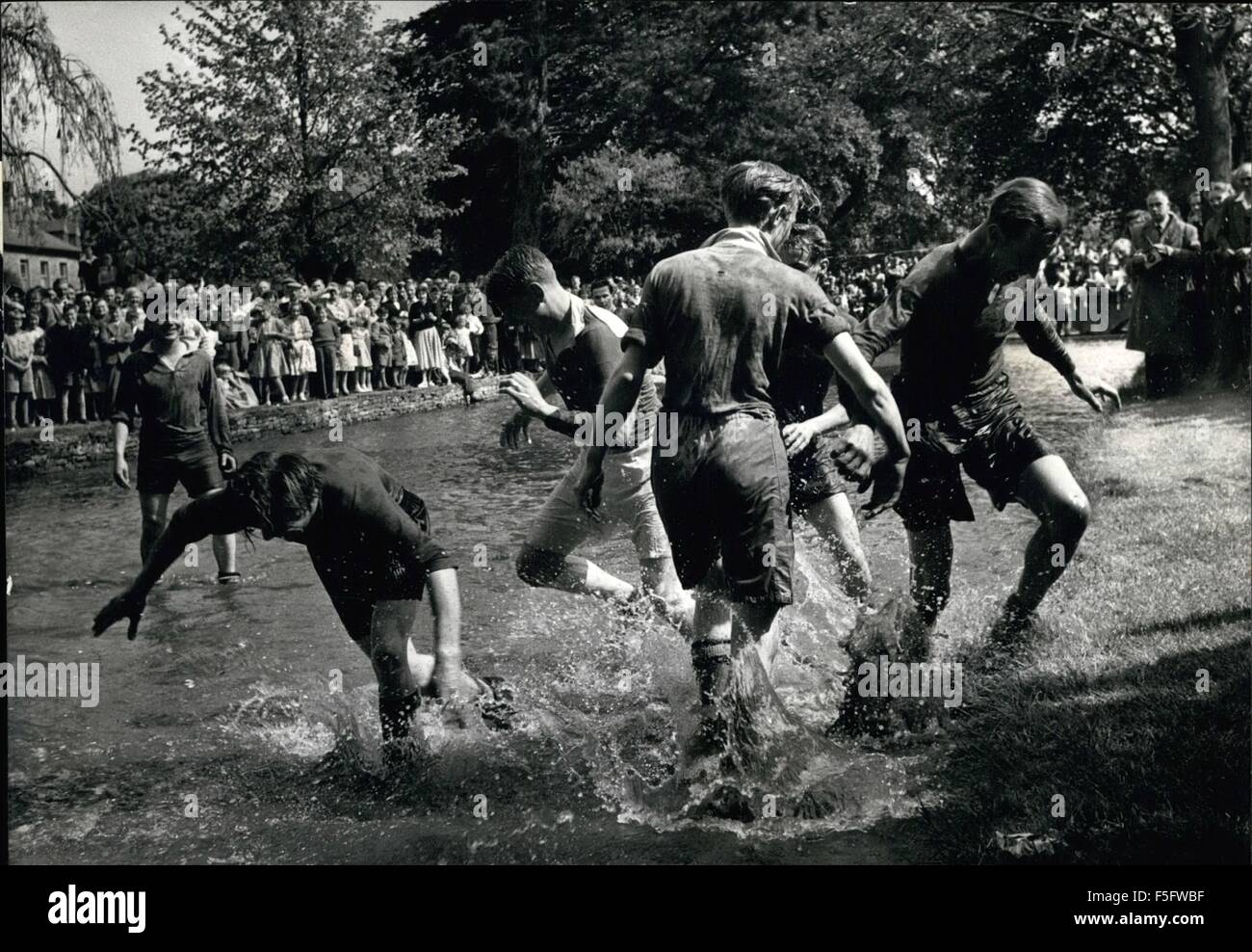 1952 - Football In The Water At Boton-On-The-Water: Good job the sun is ...