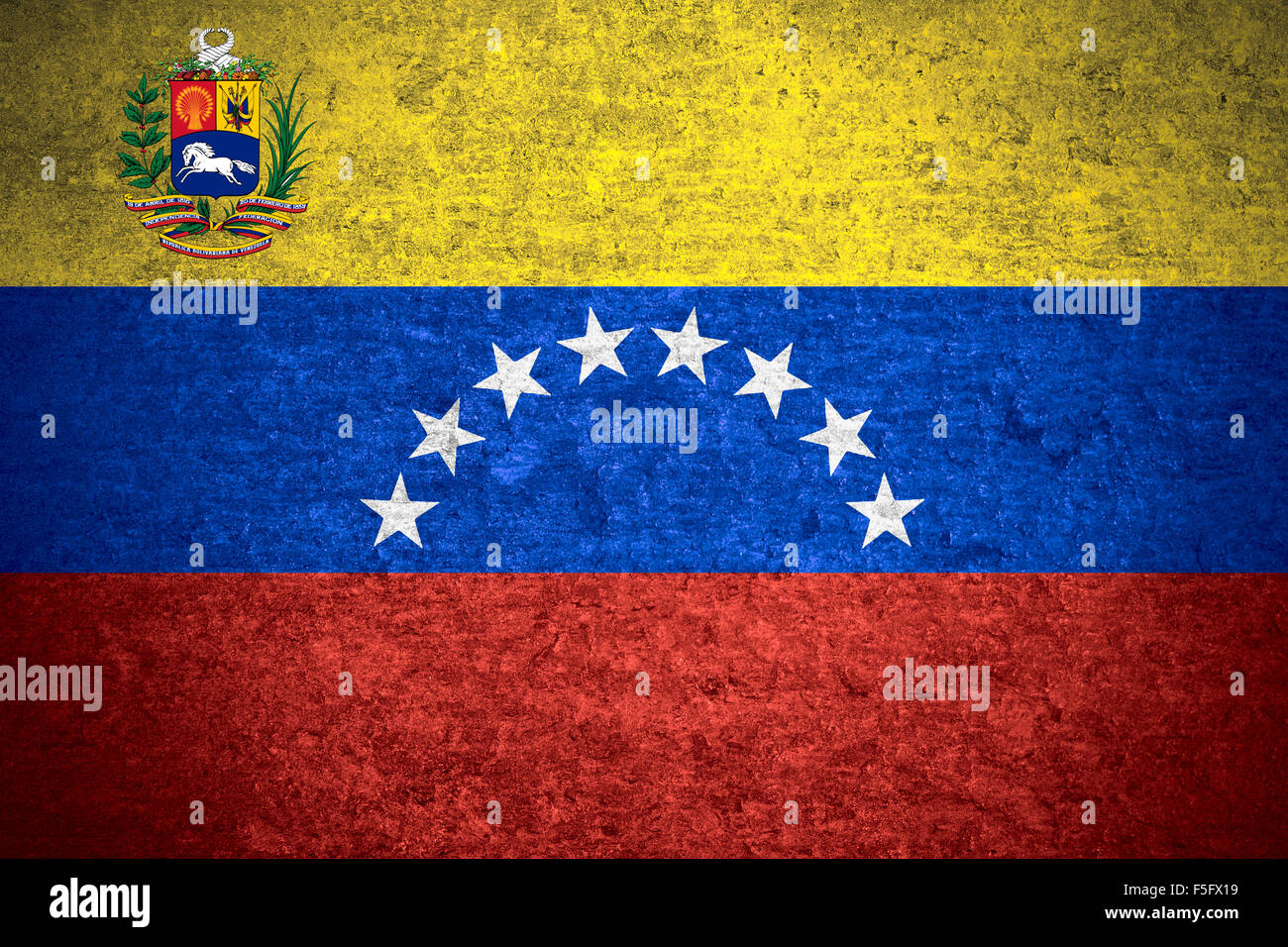 flag of Venezuela or Venezuelan banner on old metal texture background ...