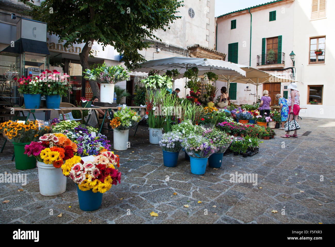 Pollensa old town Sunday market in the the main Plaza Mayor square ...