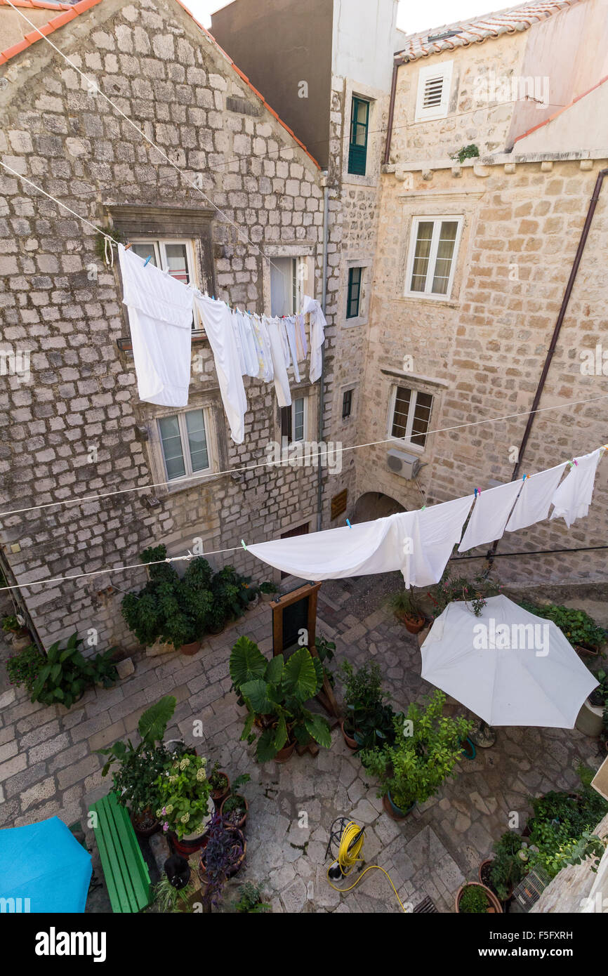 Laundry hanging at a courtyard at the Old Town in Dubrovnik, Croatia ...
