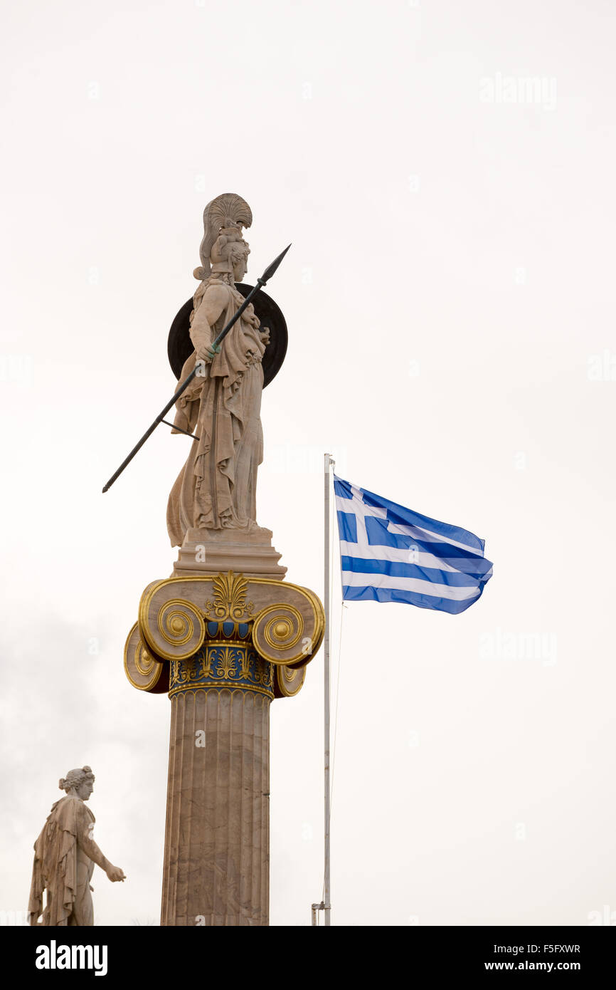 Statue of Athena and the Greek flag on the facade of the Academy of ...