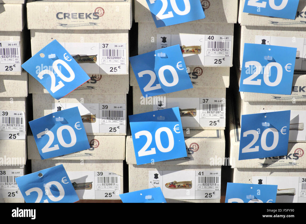 Prices at shoe boxes Stock Photo - Alamy