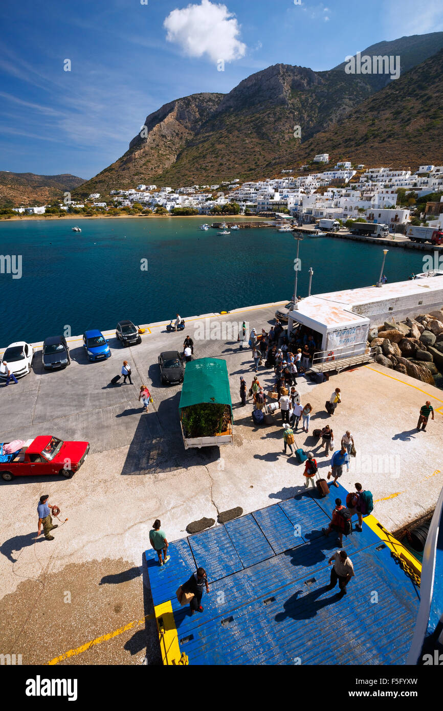 Lorry and passengers getting aboard a ferry in the port of Kamares ...