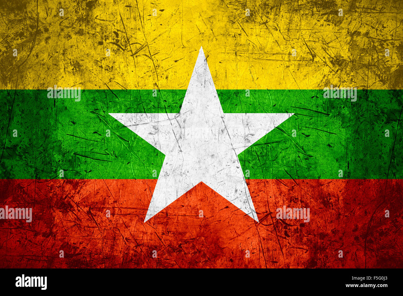 flag of Burma or Burmese banner on rough pattern metal background ...