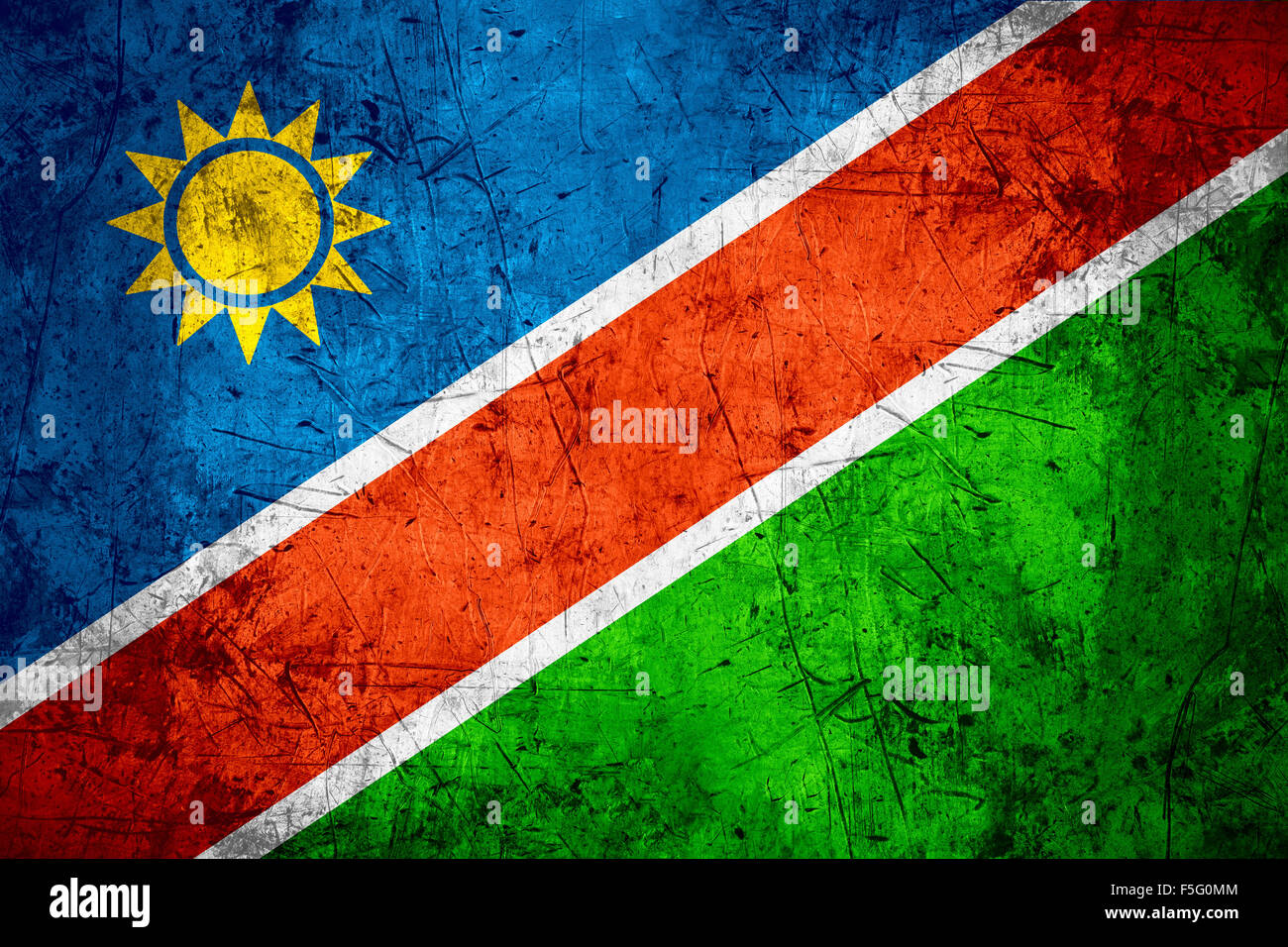 flag of Namibia or Namibian banner on rough pattern metal background ...