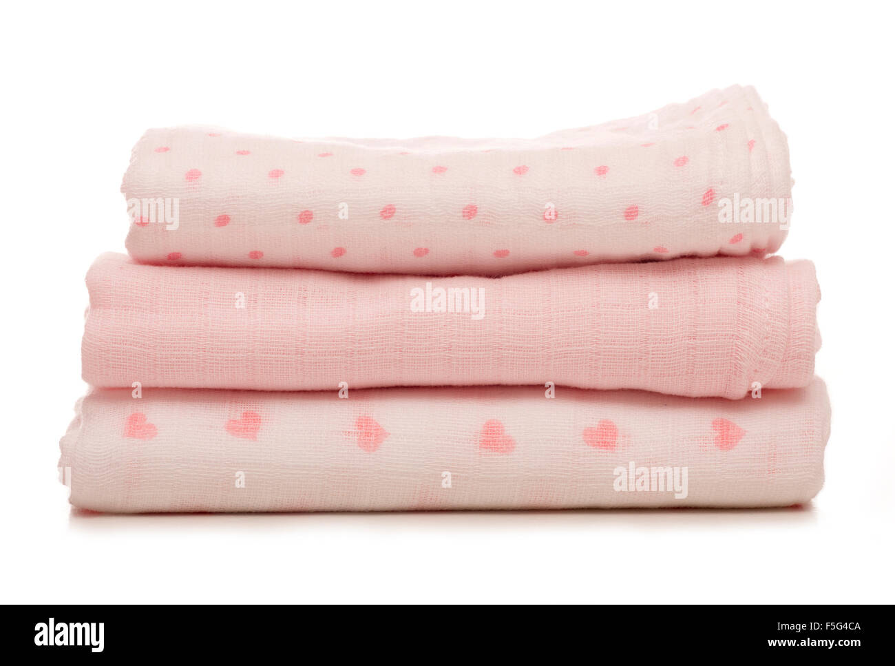 three pink baby muslins cutout Stock Photo - Alamy