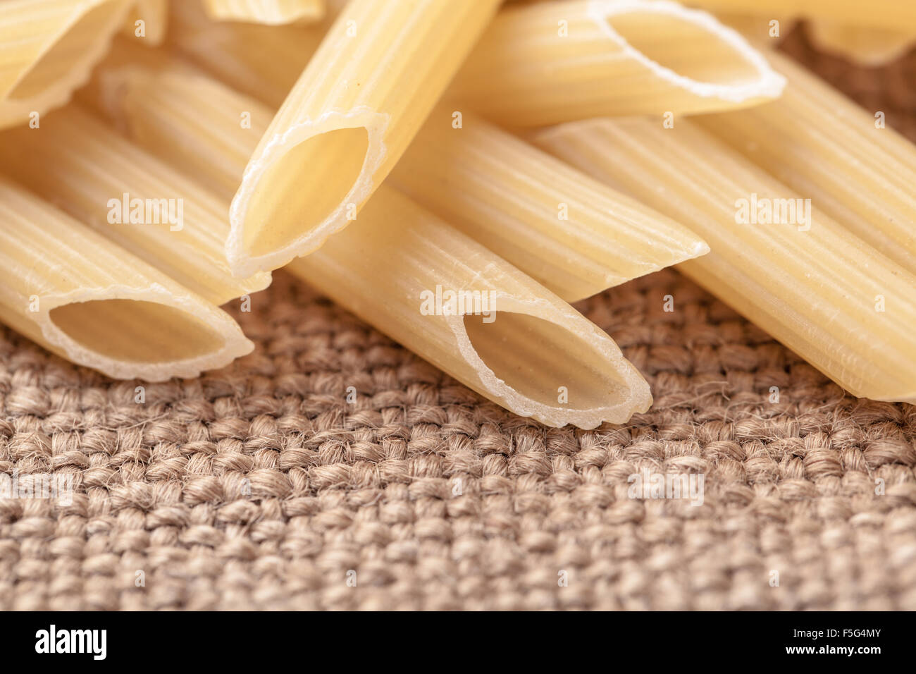 raw the pasta closeup on vintage background Stock Photo - Alamy