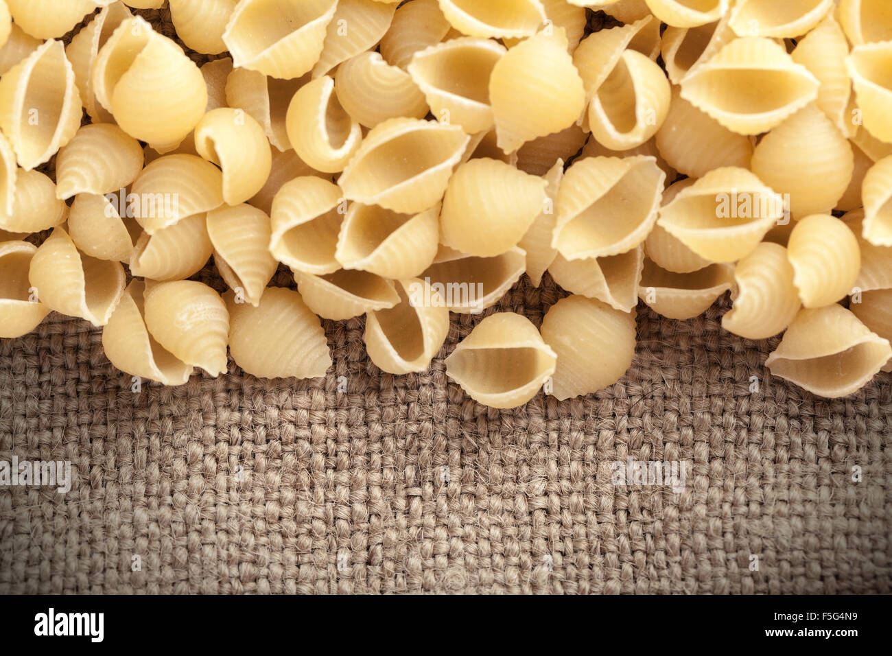 raw the pasta closeup on vintage background Stock Photo - Alamy