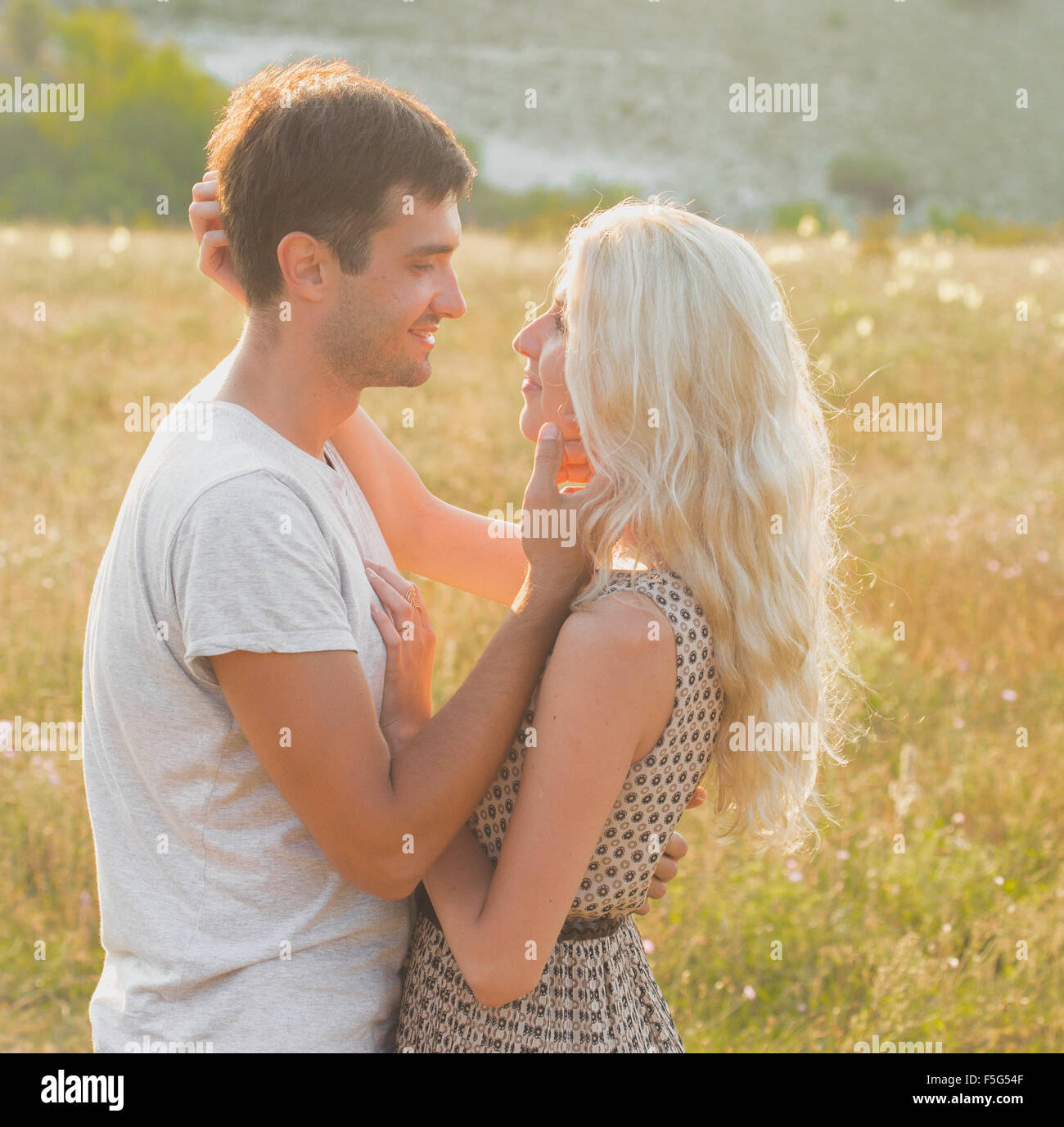 Couple in love together summer nature love relationship Stock Photo - Alamy