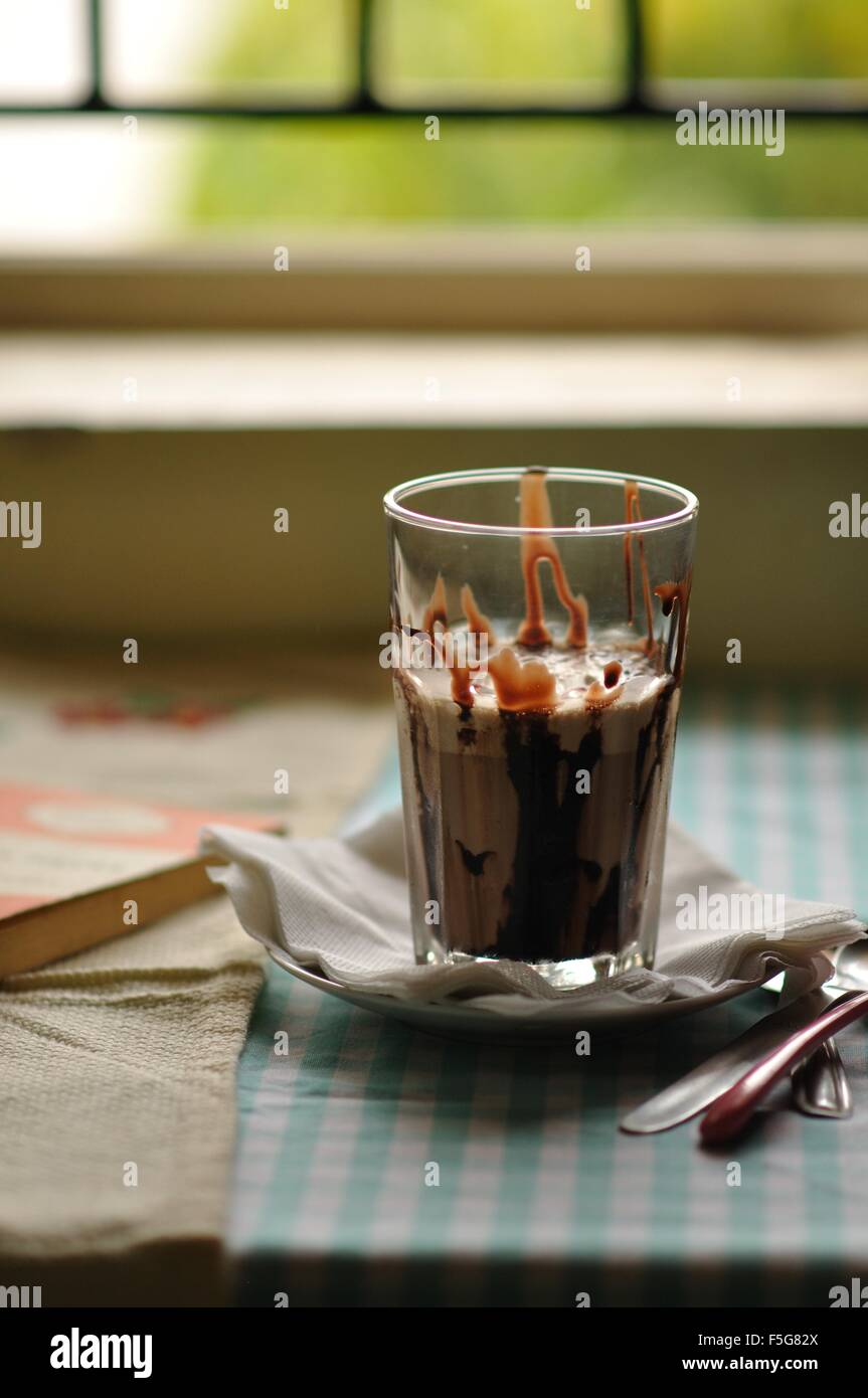 Chocolate milk with chocolate syrup Stock Photo - Alamy