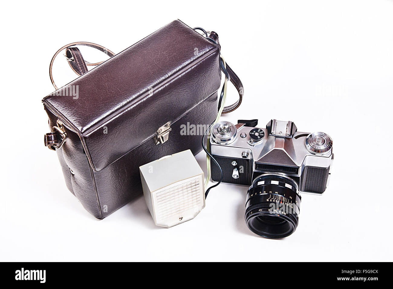 Old range finder vintage photo camera with flash isolated on white. Old ...