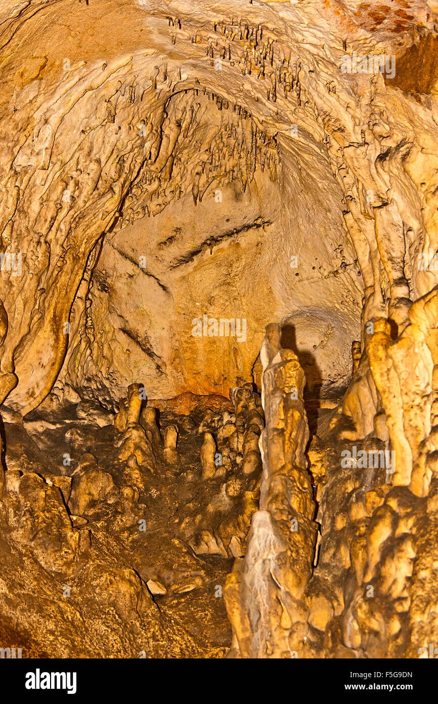Inside view of an underground cavern or cave with stalagmites and ...