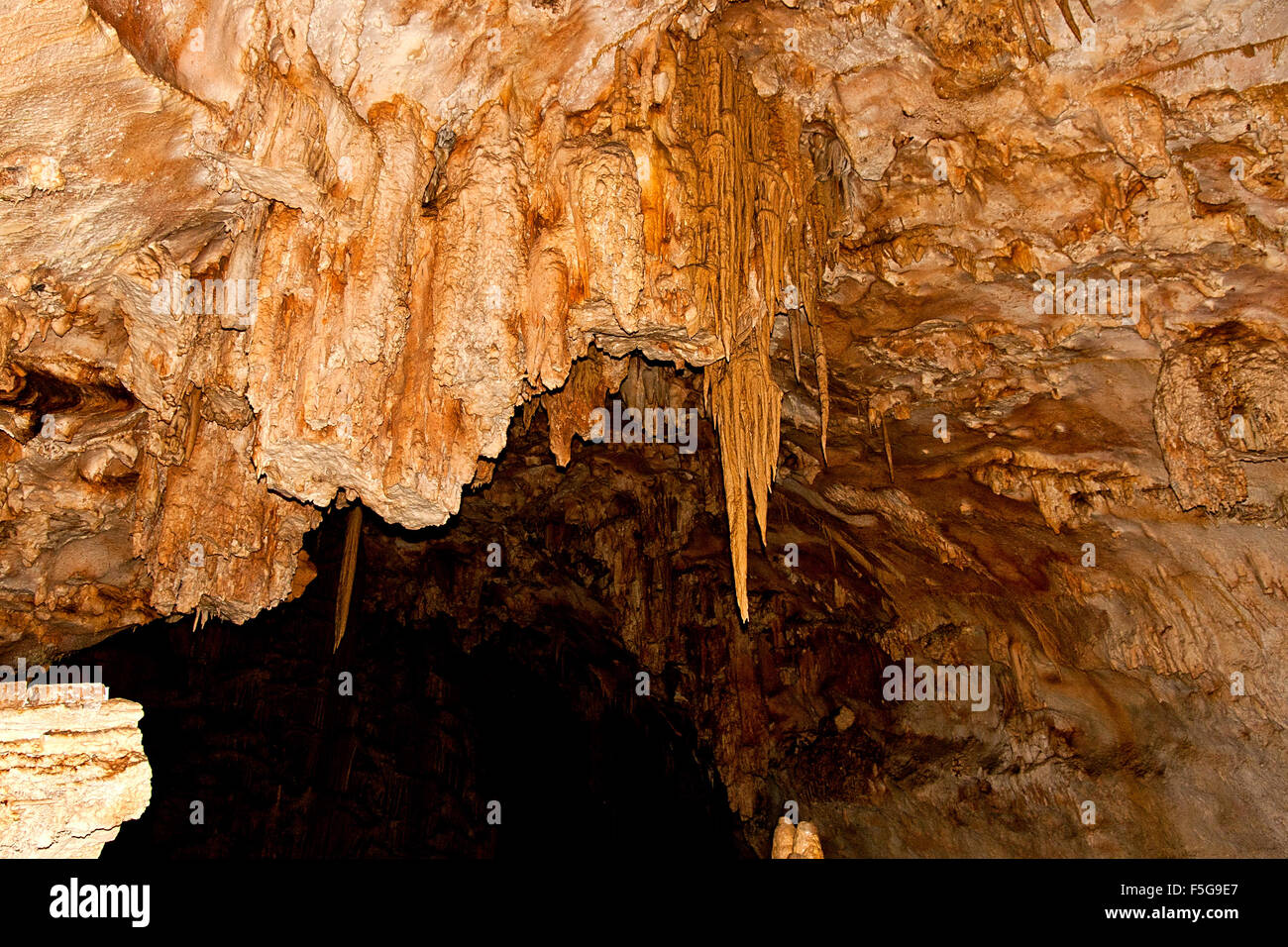 Inside view of an underground cavern or cave with stalagmites and ...
