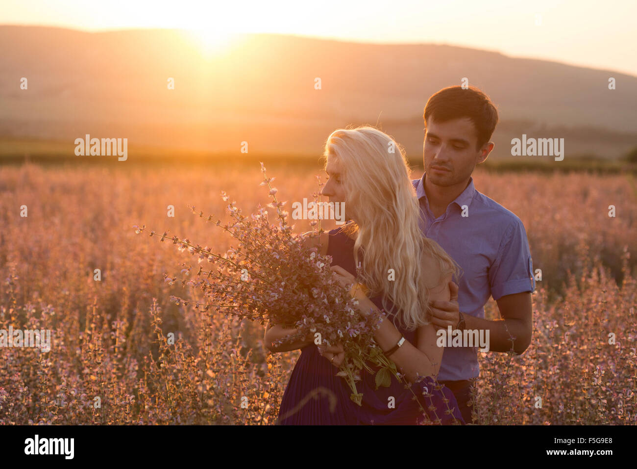Happy people outdoors beautiful landscape and couple in love with ...