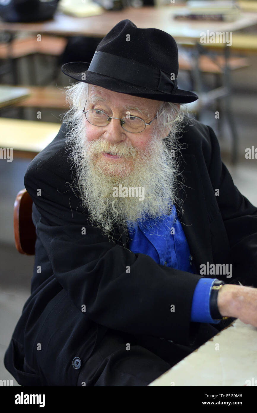 Portrait of noted Talmudic scholar Rabbi Adin Stensalz at the Ohel in ...