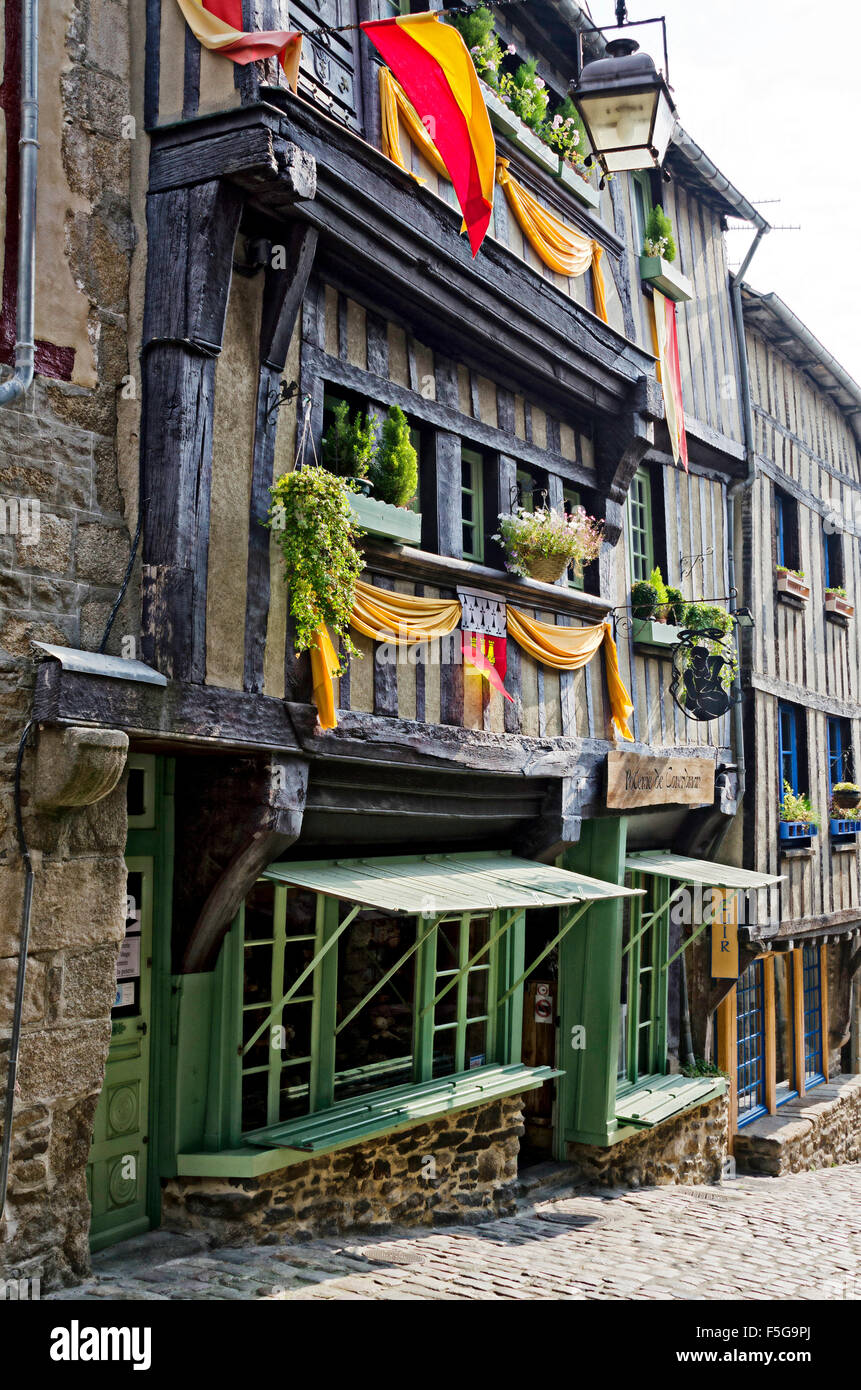 cobble street steep hill and traditional medieval wood and stone ...