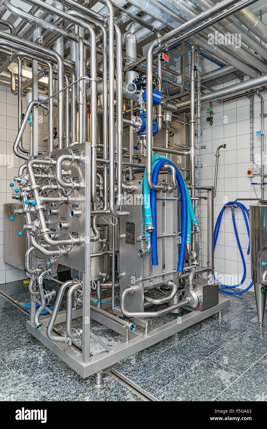 Cheese making machinerary in dairy (cheese factory) in the village of ...