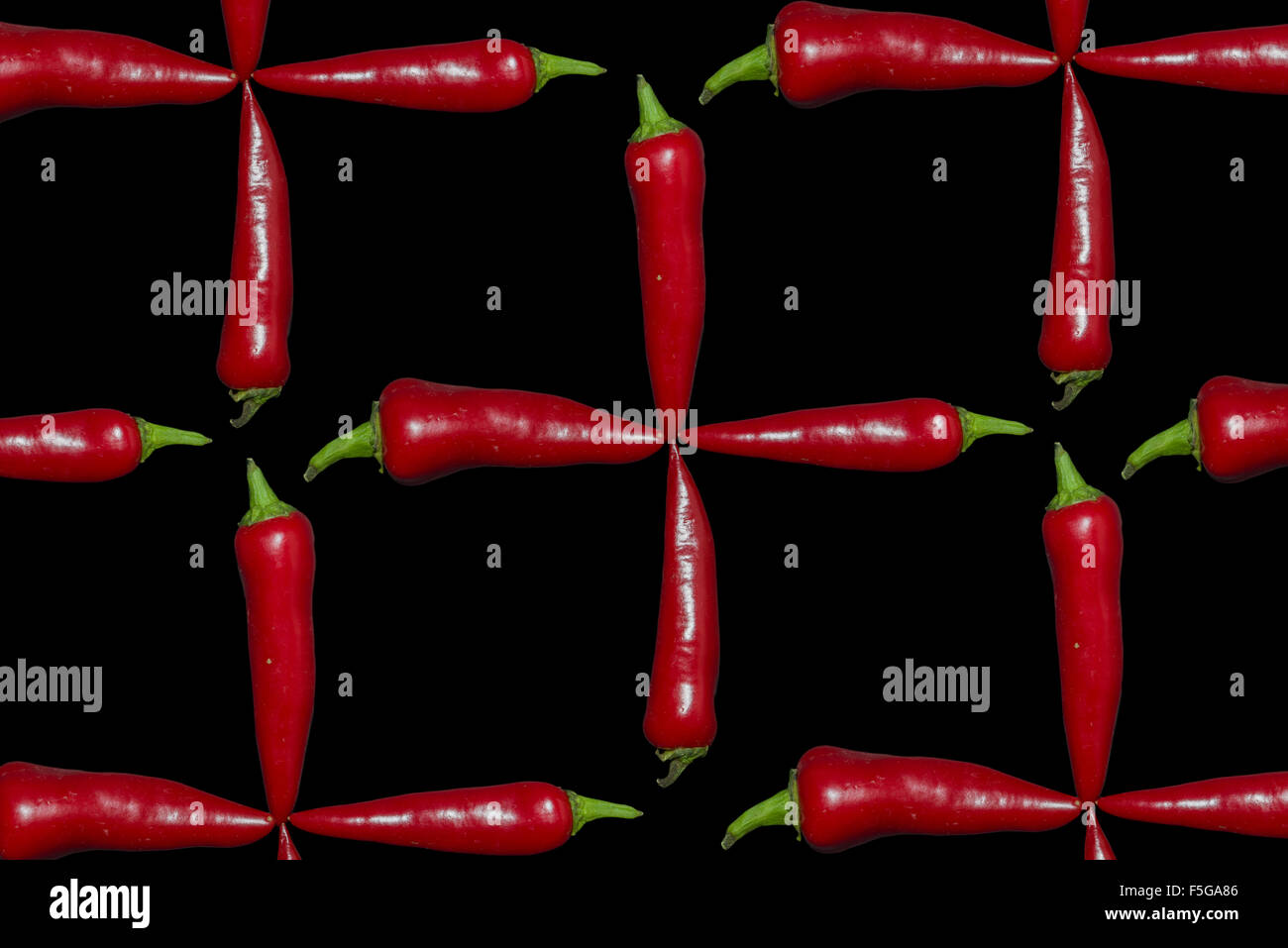 Red chili peppers in organized structure Stock Photo - Alamy
