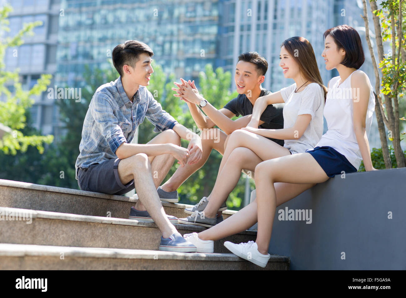 Adults talking together hi-res stock photography and images - Alamy
