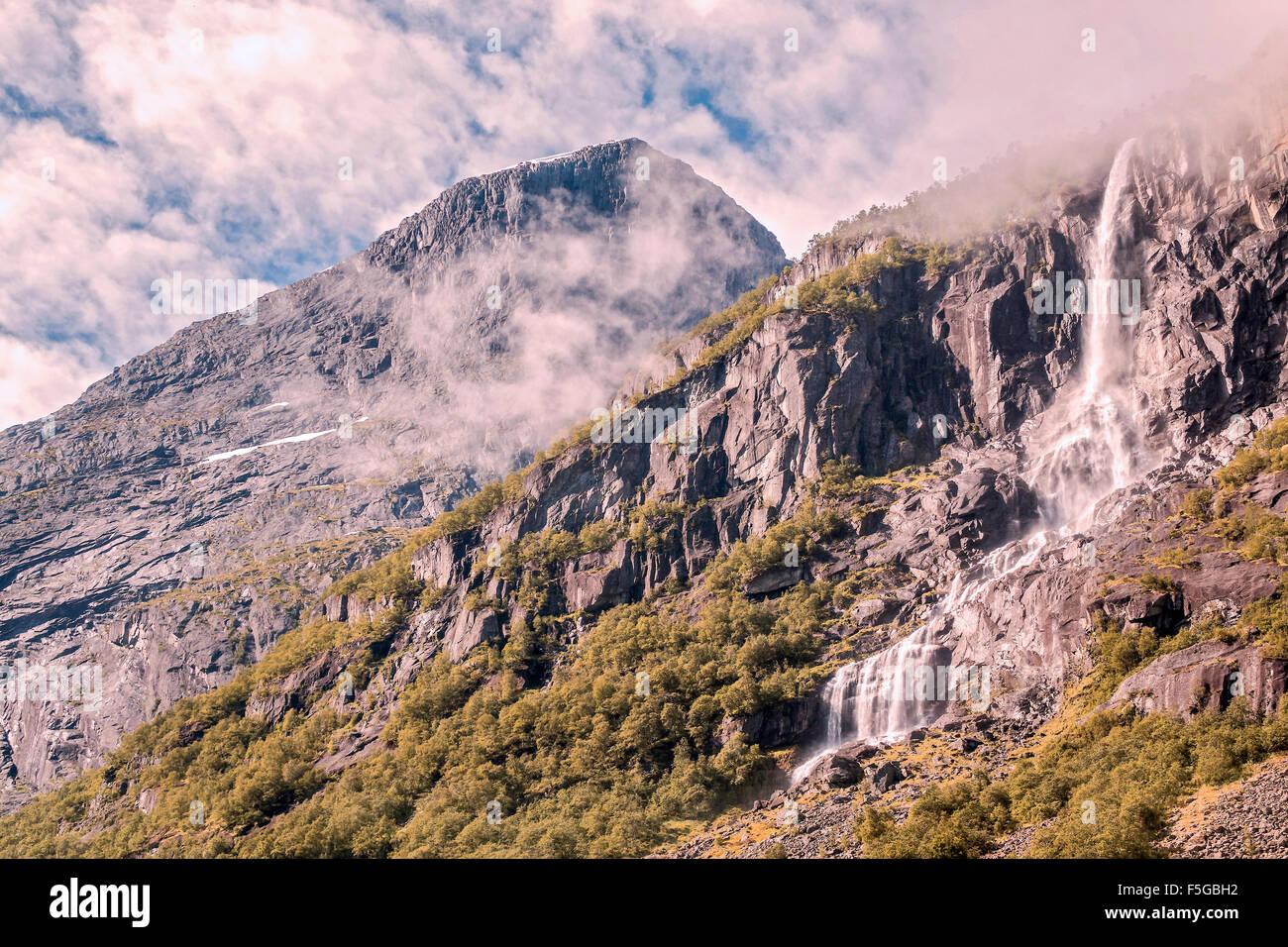 Waterfall In The Mountains Olden Norway Stock Photo - Alamy