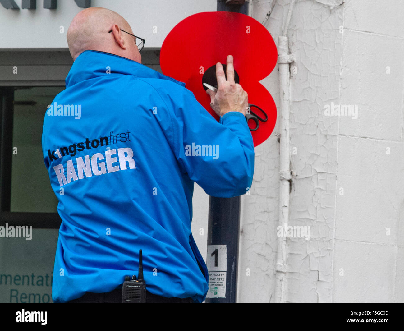 Kingston London,UK. 4th November 2015. A Kingston Ranger attaches large ...