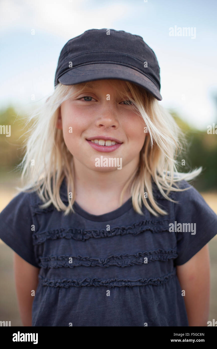 Girl baseball cap smiling hi-res stock photography and images - Alamy